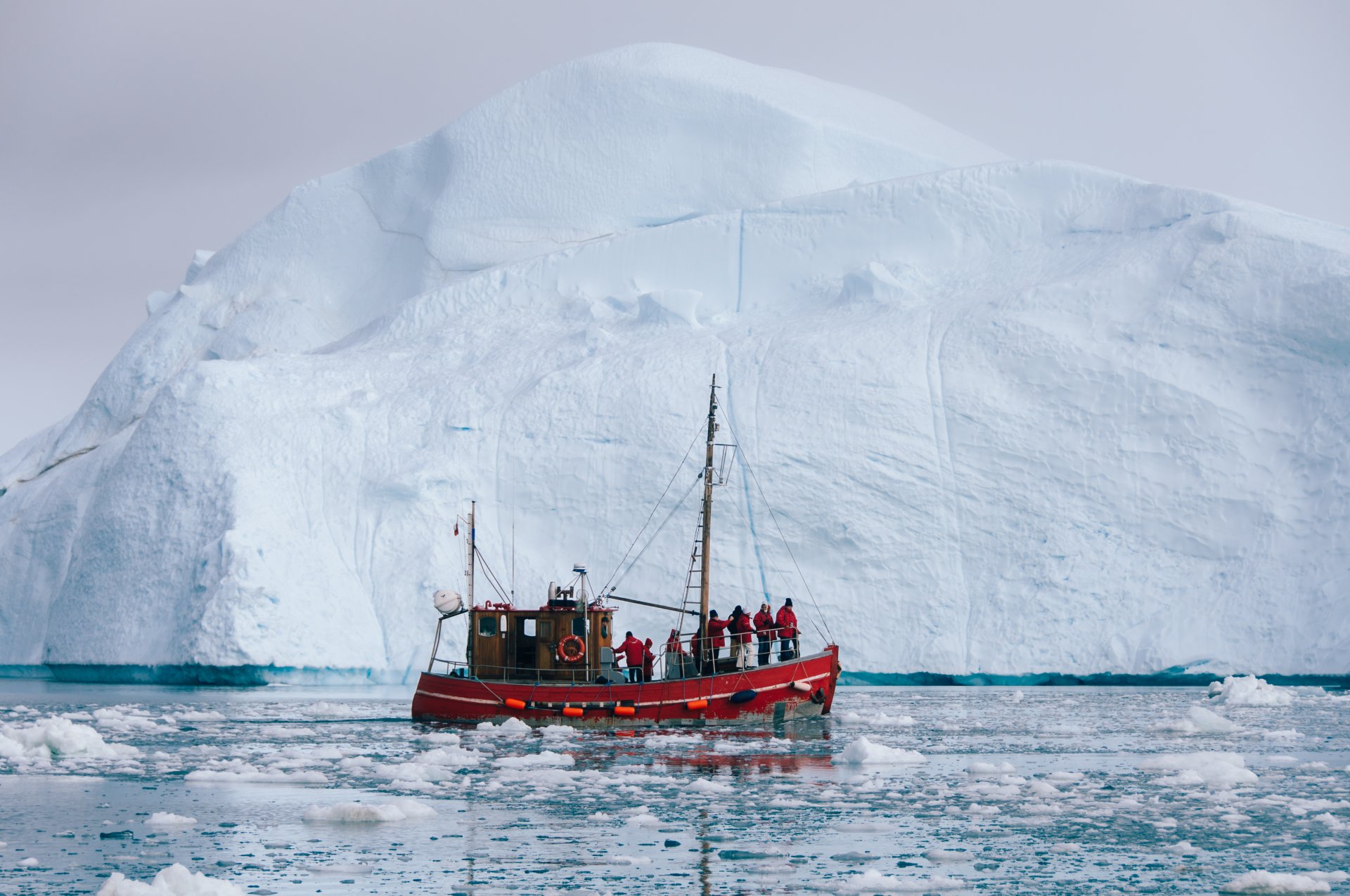 Arctic Voyage: 4K Ultra HD Boat Cruises Past Majestic Iceberg