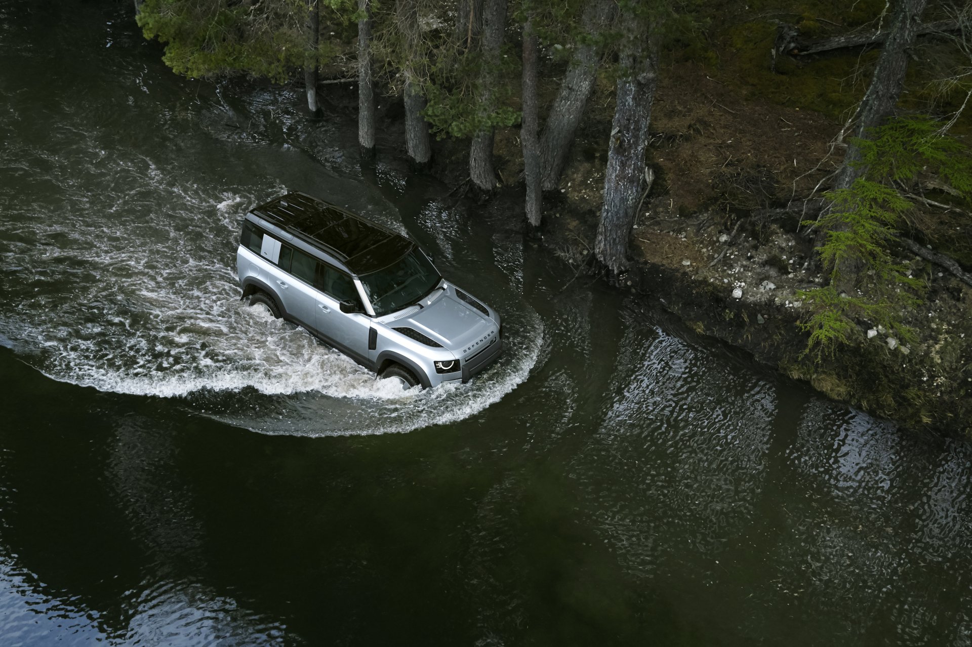 Land Rover Defender 4K Wallpaper — Rugged SUV River Crossing