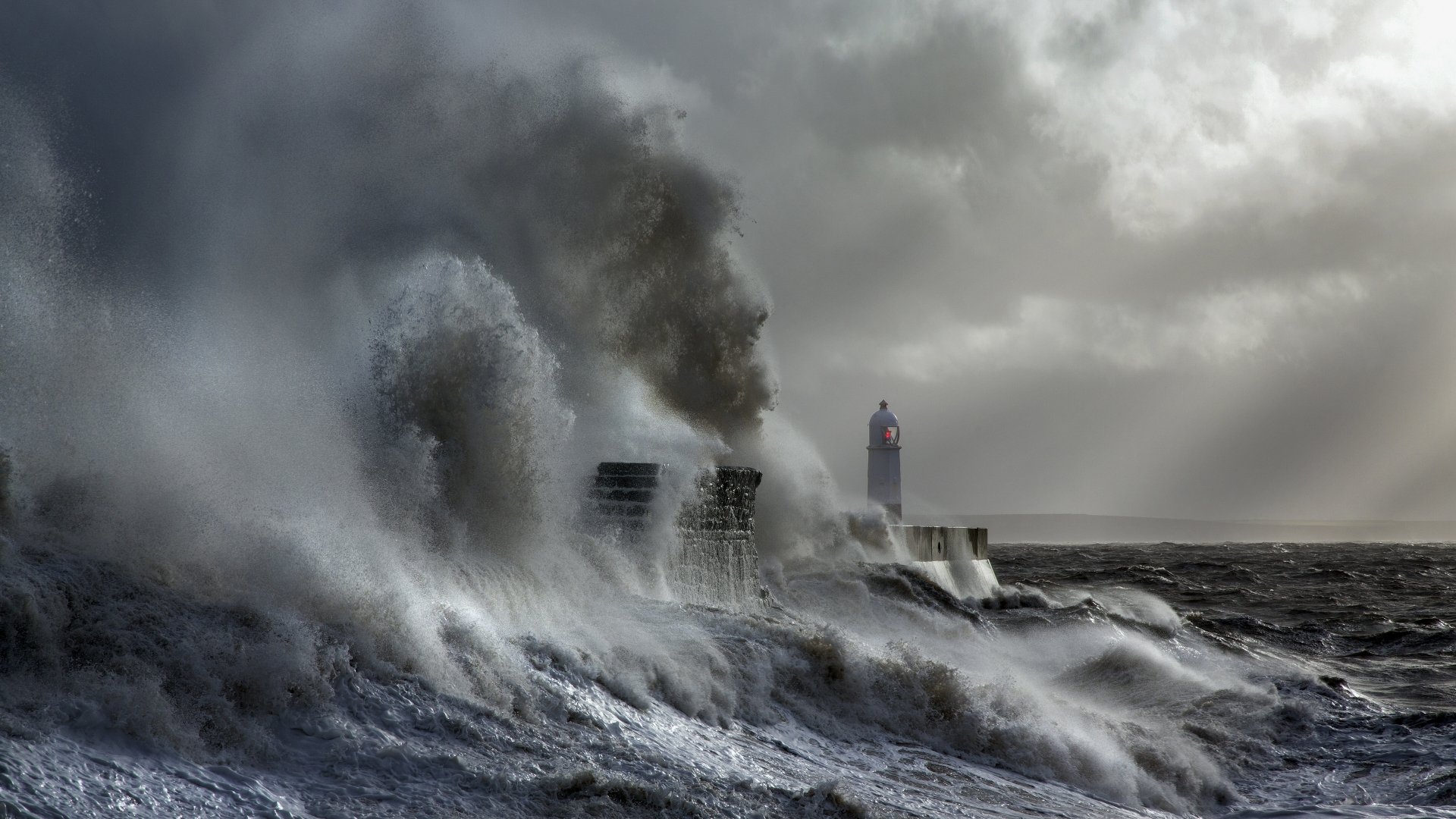 4K Ultra HD Stormy Ocean Waves Crashing on Lighthouse Amid Dark Clouds