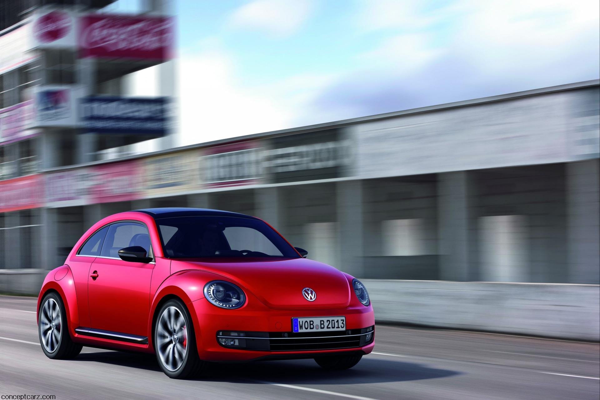 Sleek Red Volkswagen Beetle HD Wallpaper - Classic Ride in Motion