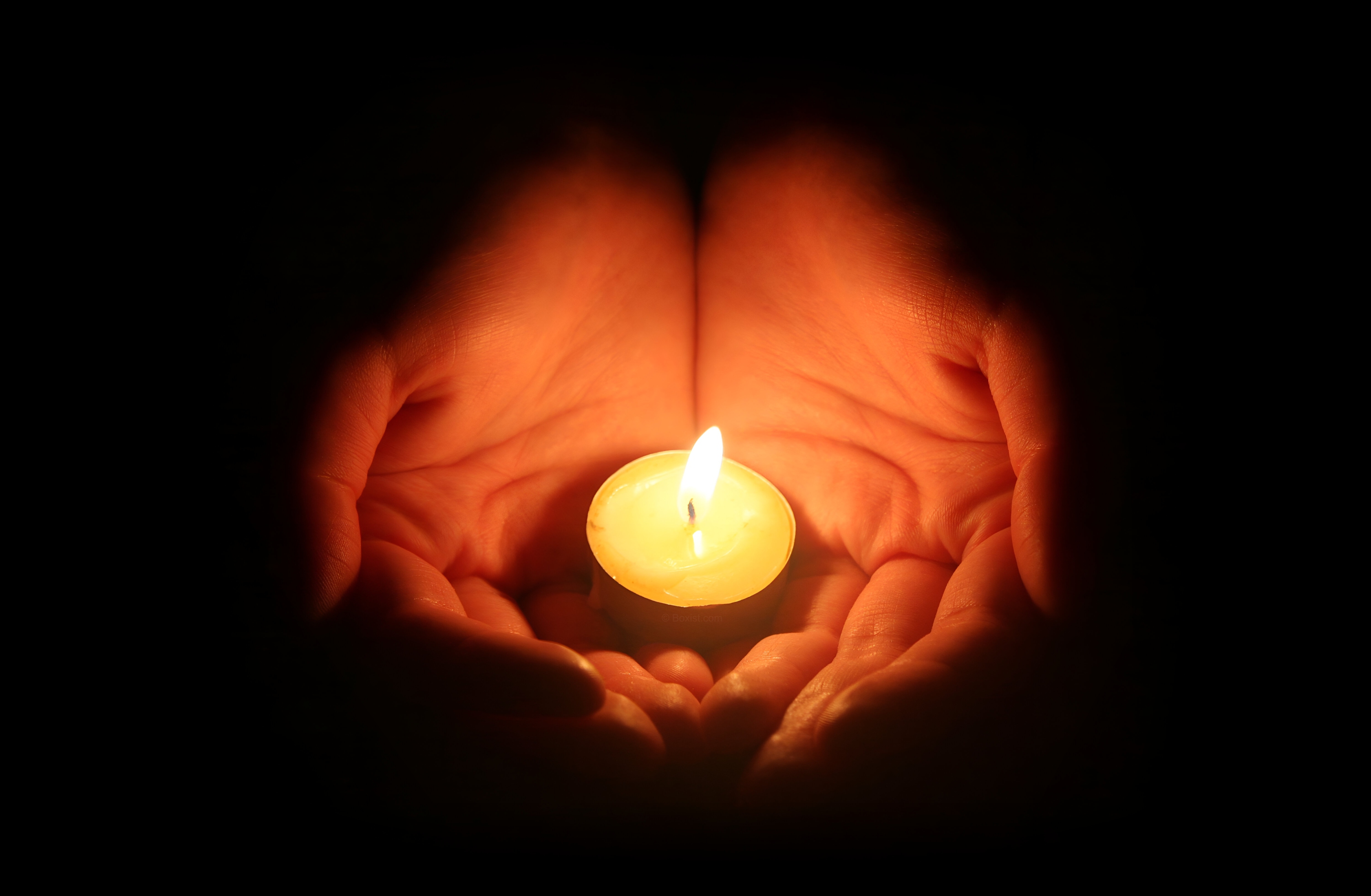 Hands Holding Small Candle In The Dark by Crystal2009