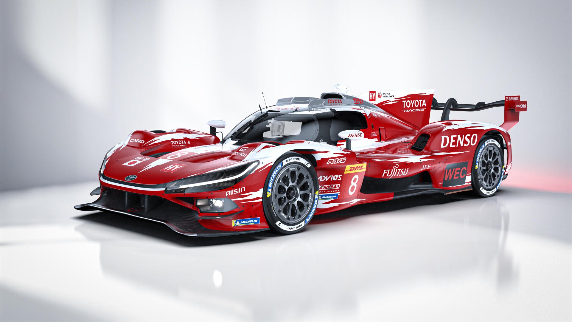 Red Charge: Toyota TR010 Hybrid Race Car — 4K Ultra HD Wallpaper
