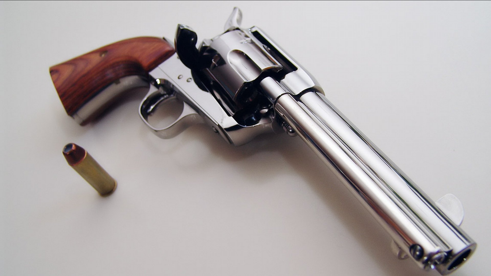 HD Revolver Precision: Sleek Man-Made Silver Classic