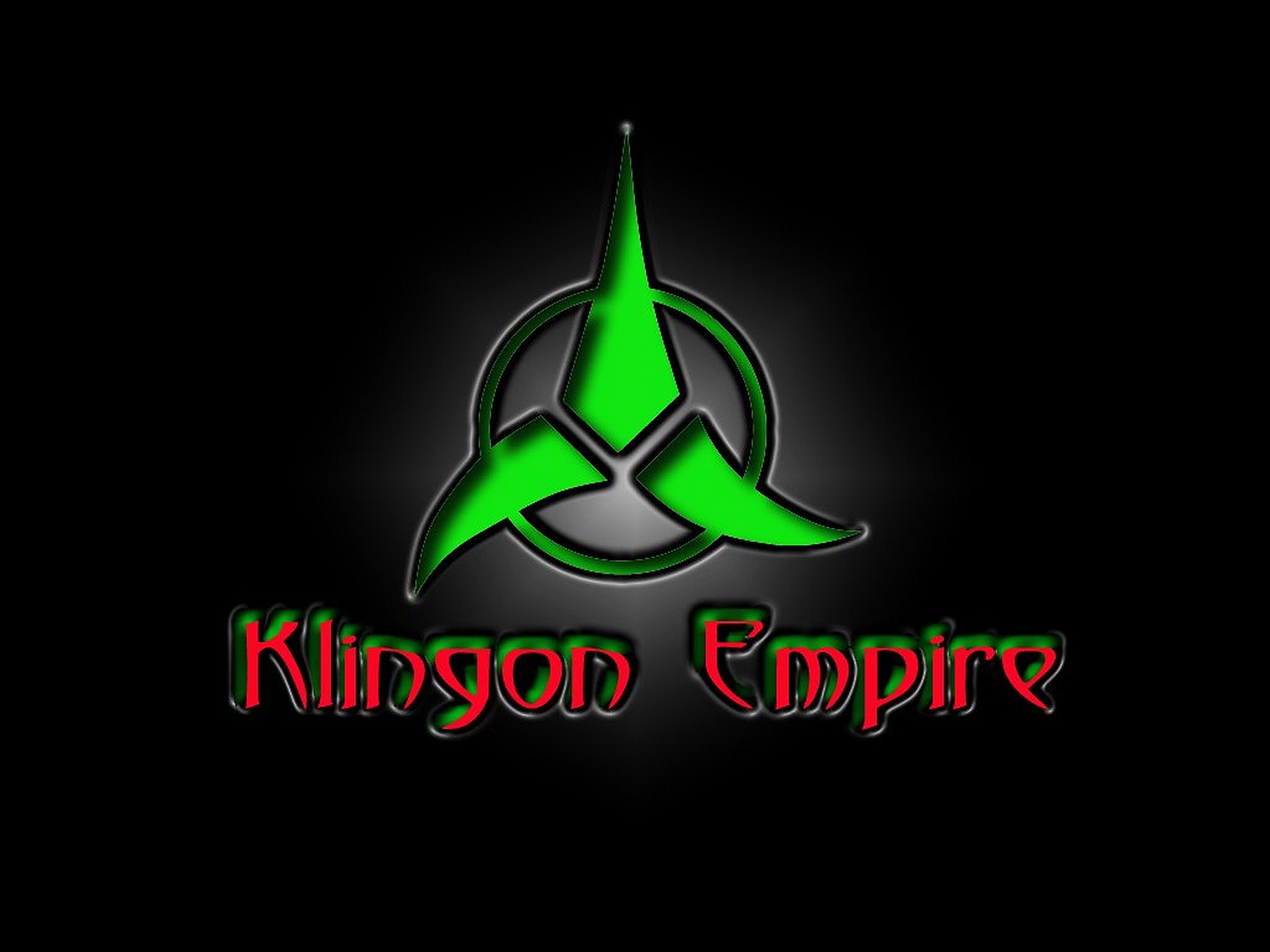 Klingon Empire Wallpaper A Black And White Logo With A Figure In The