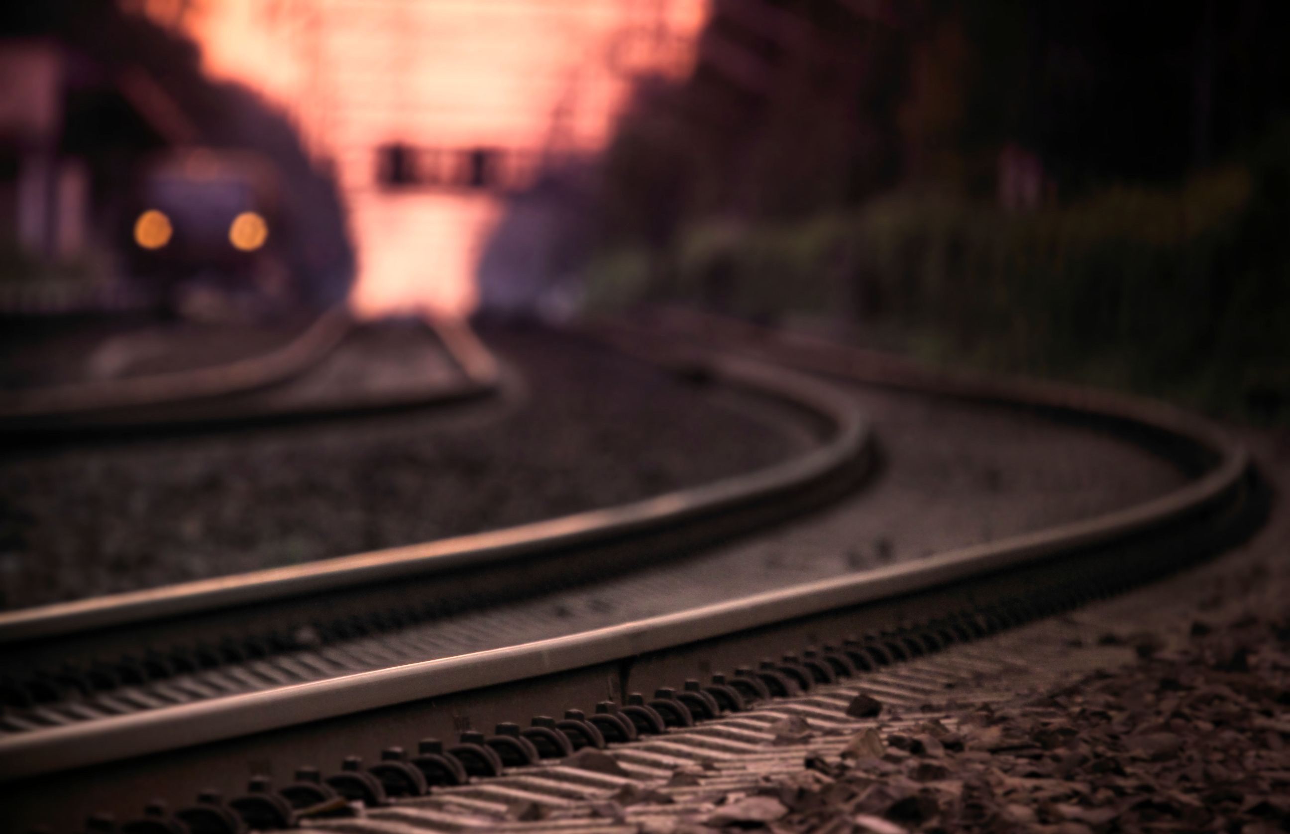 HD Railroad Tracks at Sunset – Man-Made Journey in Focus
