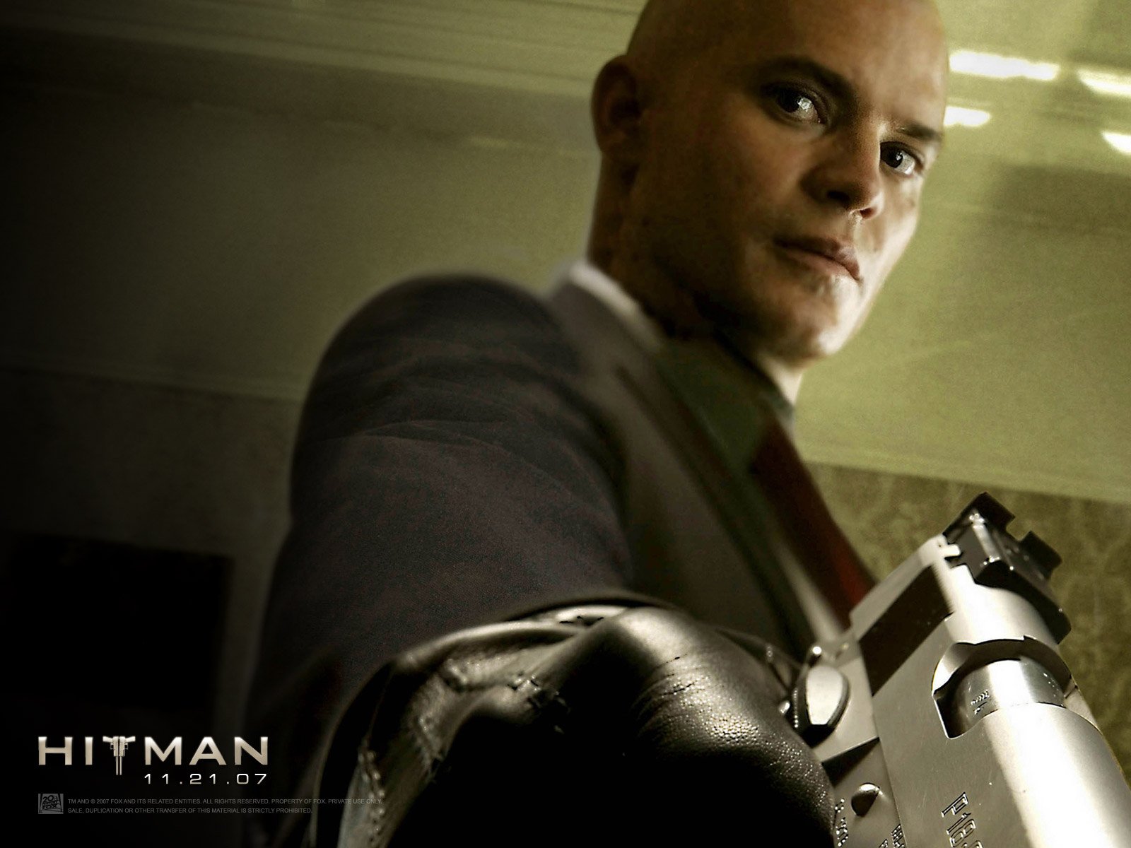Hitman HD Wallpaper: A Stylish Action Movie Experience