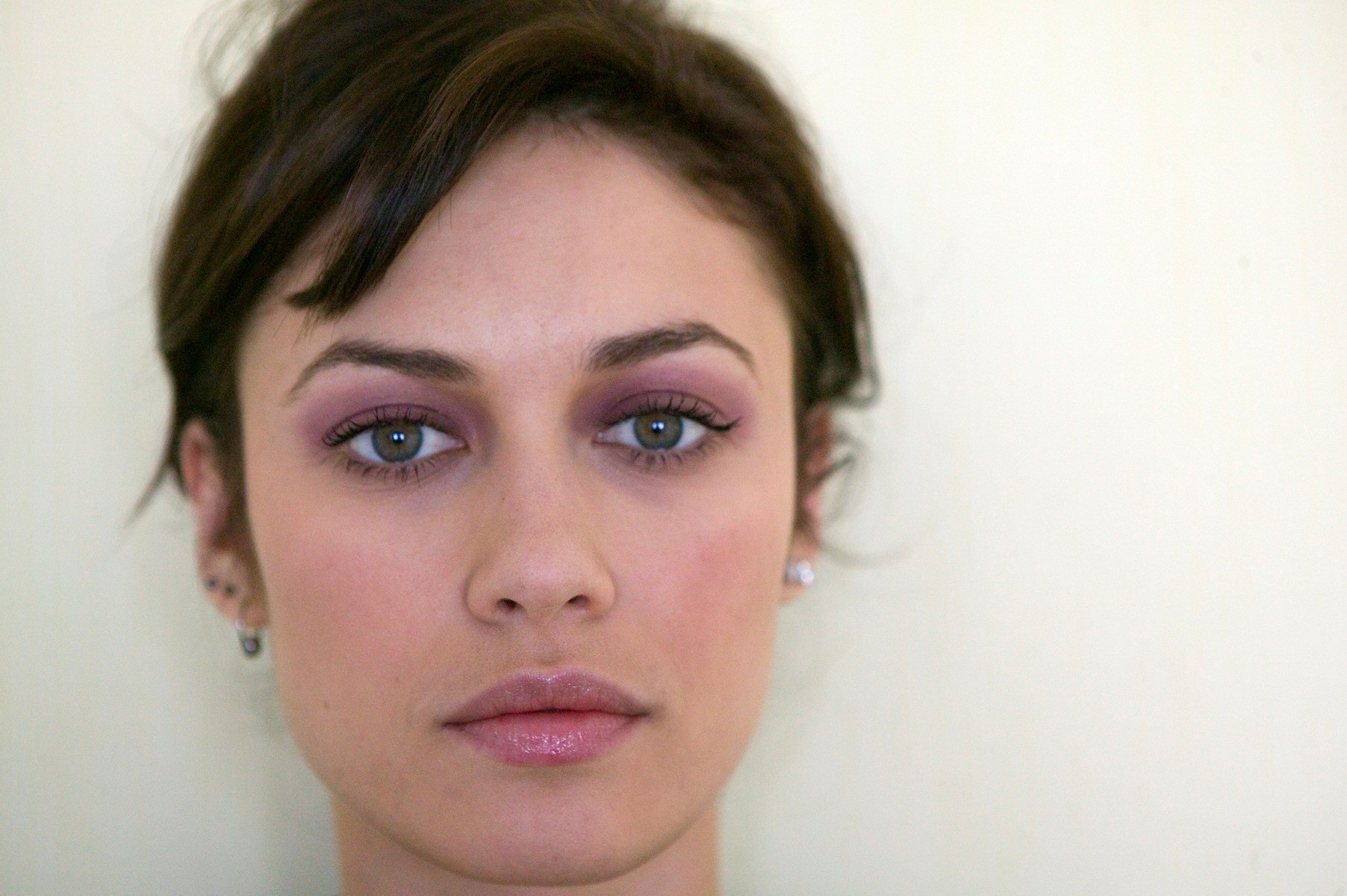 Stunning HD Portrait of Olga Kurylenko – Celebrity Elegance Wallpaper