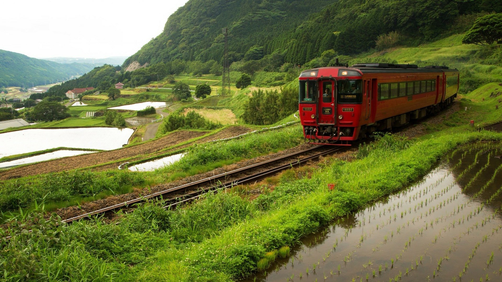 Scenic Train Journey: A Stunning HD Wallpaper | 1920x1080 | Wallpaper Abyss