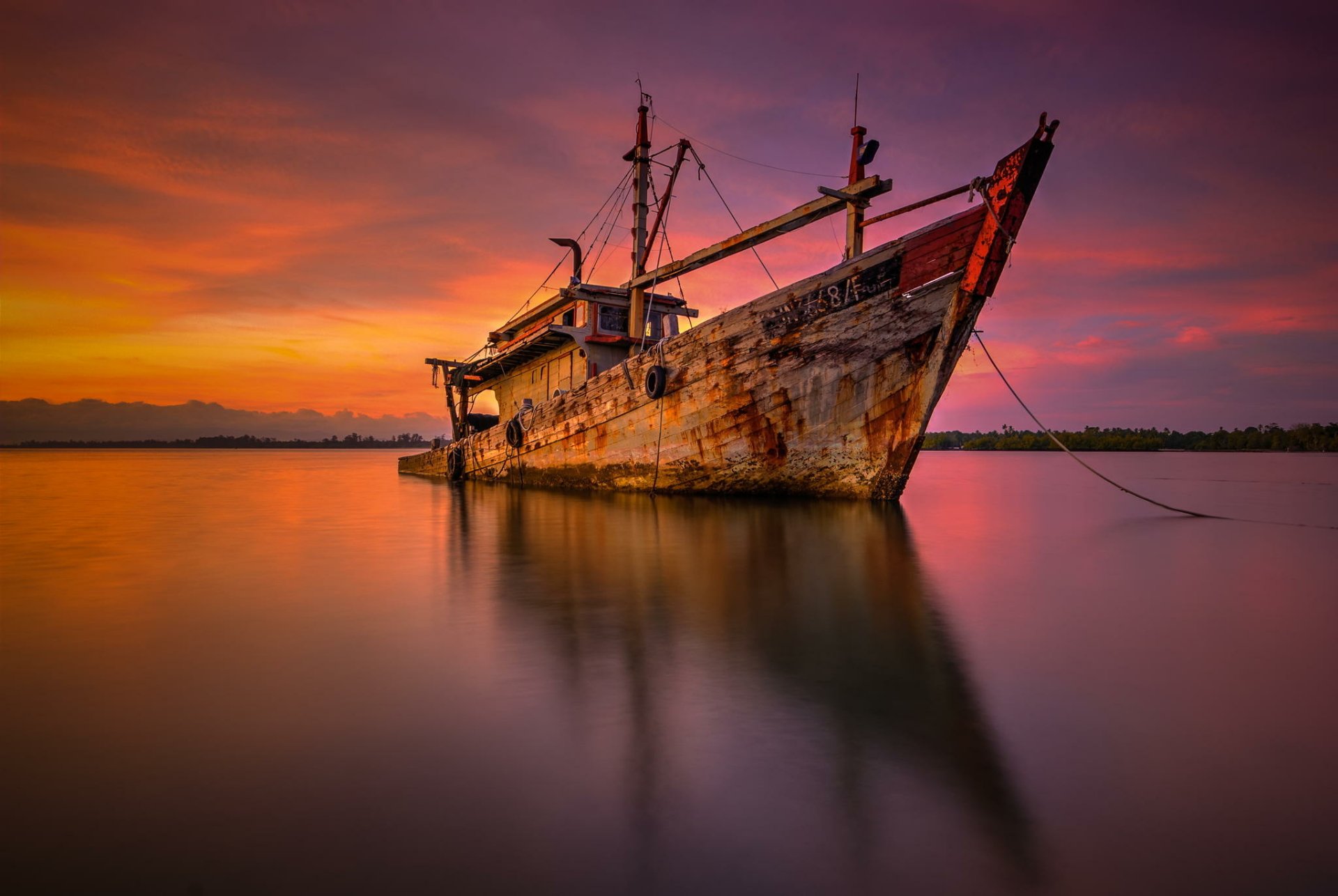 Rusting Wreck at Purple Sunset: Serene Reflection HD Wallpaper