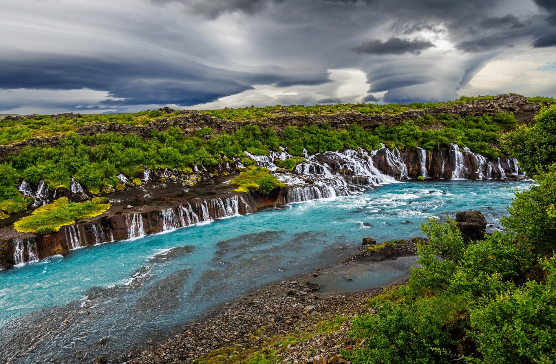 Hraunfossar Waterfall: Stormy Skies Over Iceland’s Majestic River ...