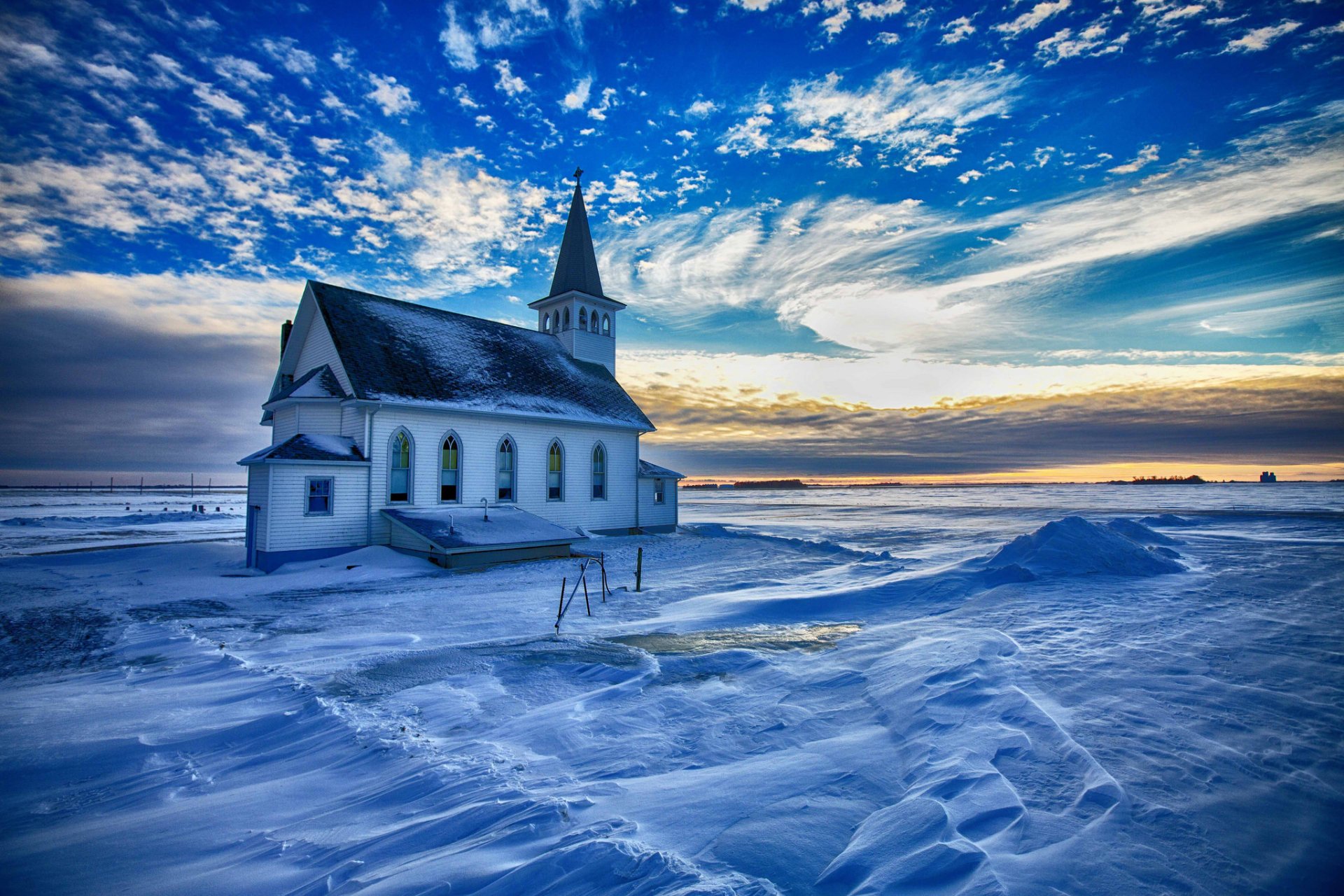 Winter Serenity: Snow-Covered Church Beneath a Vast Sky Horizon ...