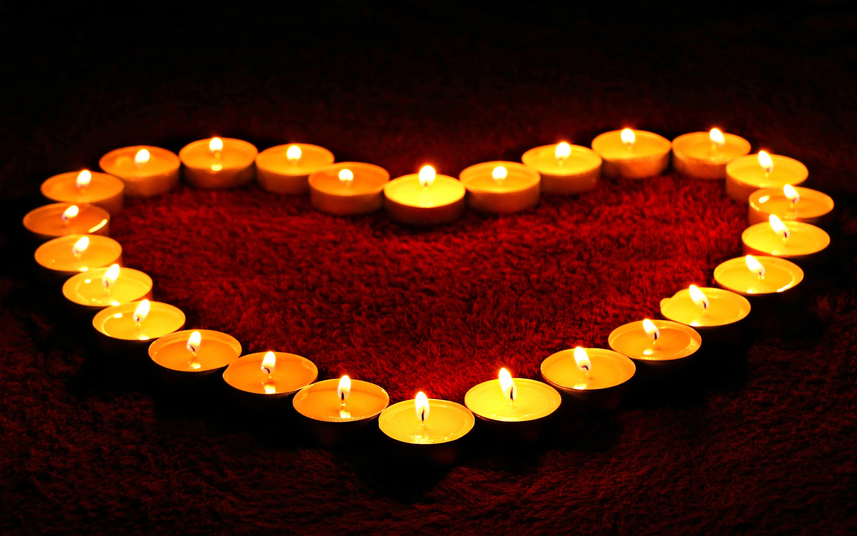 Heartfelt Flame: Stunning HD Candlelight Heart-Shaped Glow Wallpaper