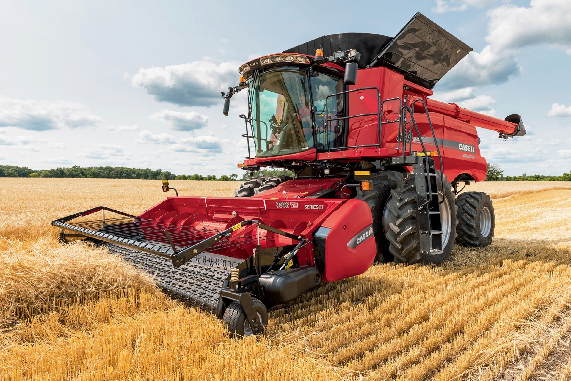 Summer Wheat Harvest: Powerful Red Tractor in a Golden Field - HD Wallpaper