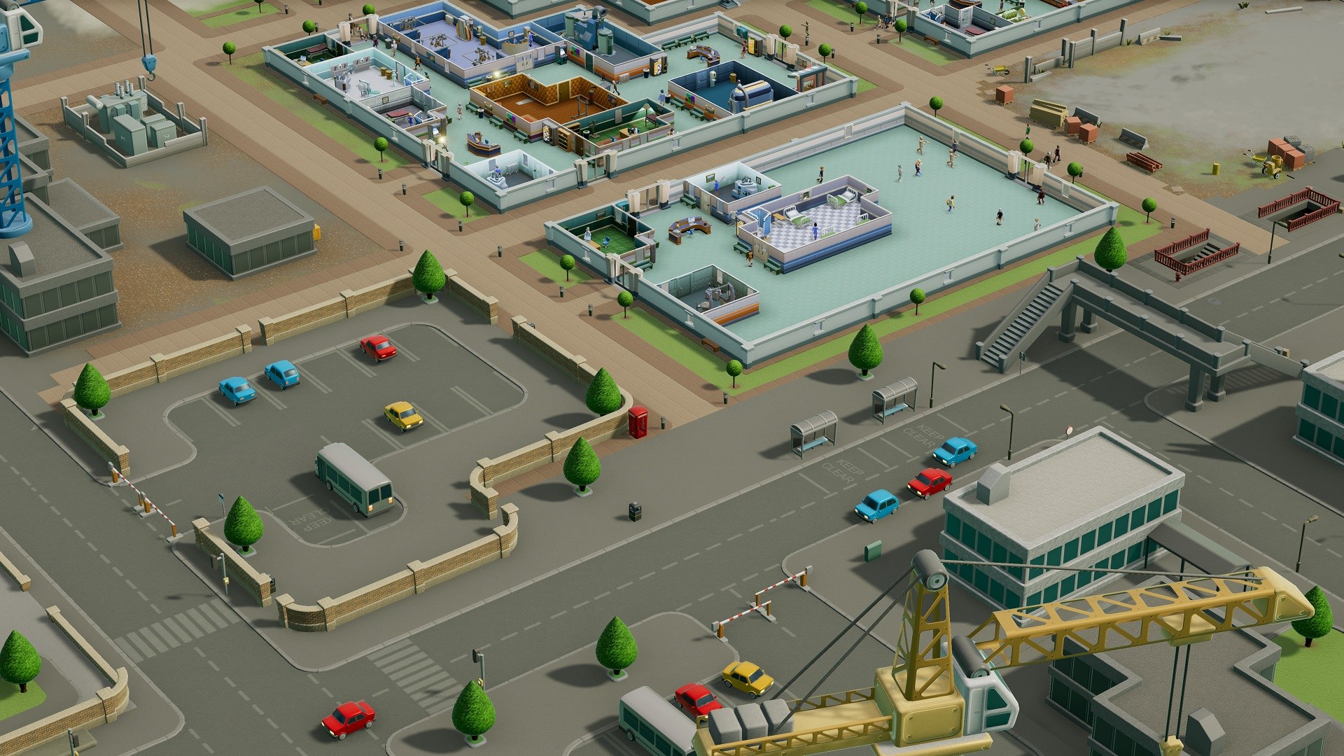 Two Point Hospital HD Wallpaper – Vibrant Clinic Gameplay Scene