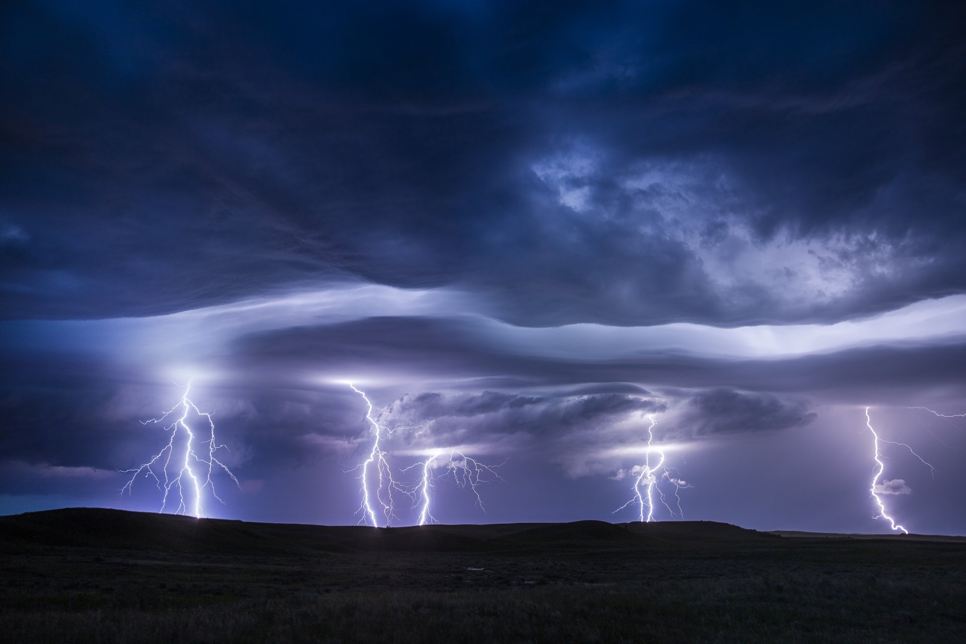 Electrifying Nature: Stunning Lightning Strikes Across Dark Cloudscape ...