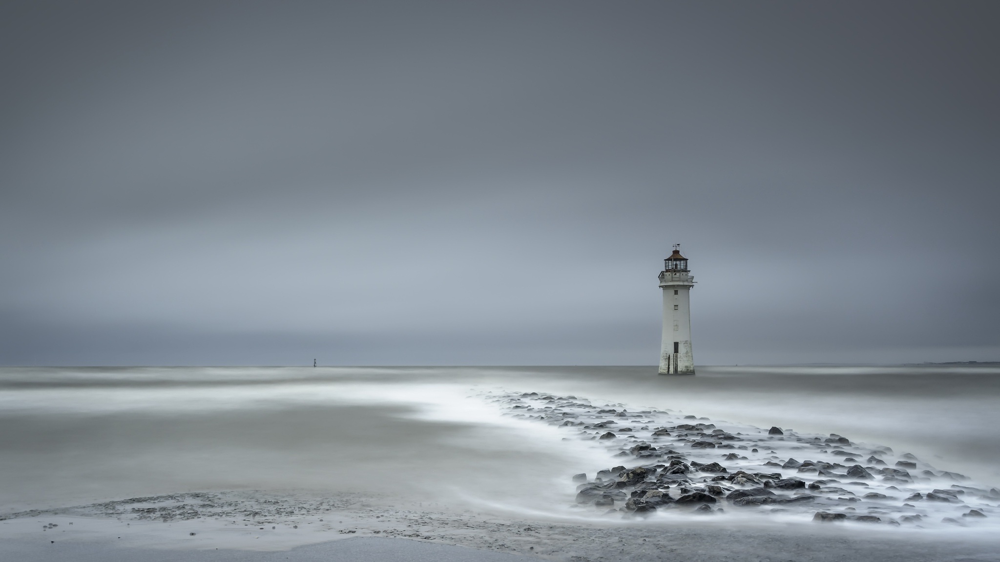 Serene Ocean Horizon with Lighthouse HD Wallpaper